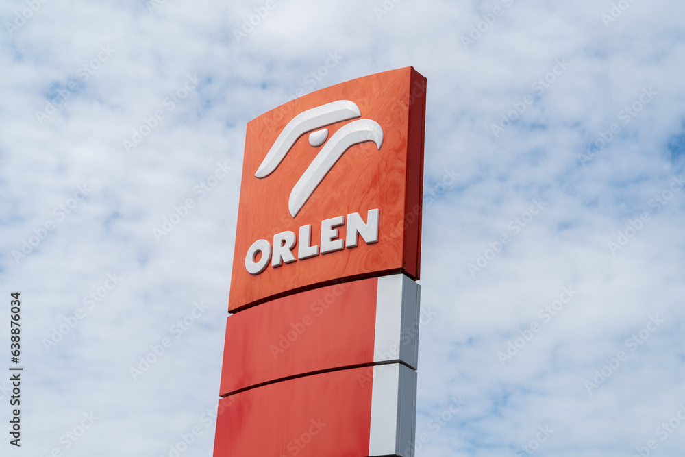 Orlen logo sign outside a petrol station. Logotype at fuel filling gas ...