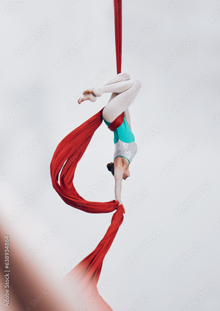 Aerial, woman gymnast and ribbon for sport performance with flexibility ...