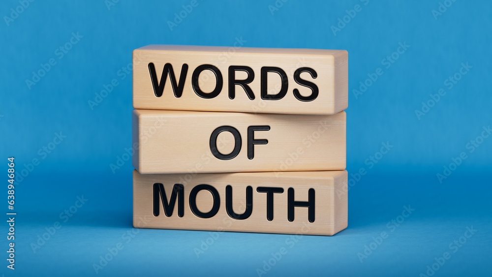 Words of mouth symbol. Concept words Words of mouth on wooden blocks ...