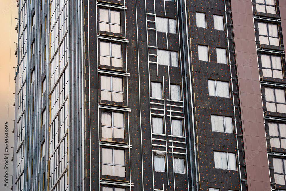 Insulation wall facade of high-rise residential building. Thermal ...