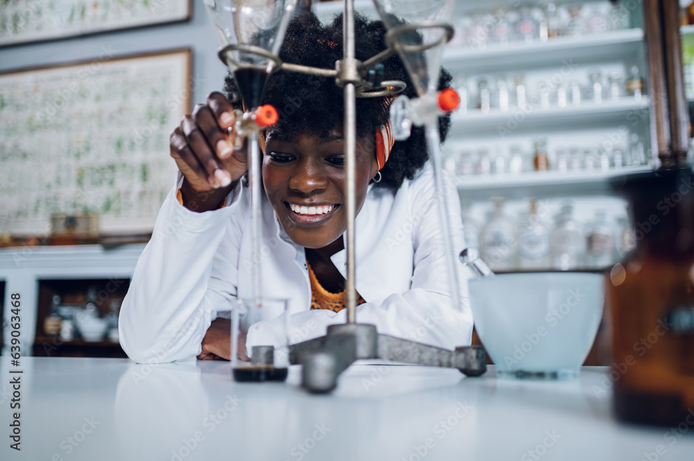 An african american chemist is standing in a vintage drugstore and ...