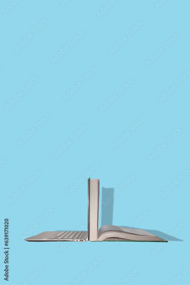 Cover page with modern laptop computer positioned back to back with ...
