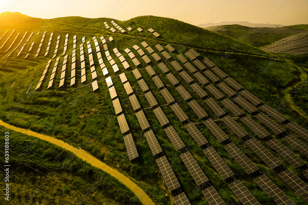 Aerial photography of solar photovoltaic cells built on a hillside ...