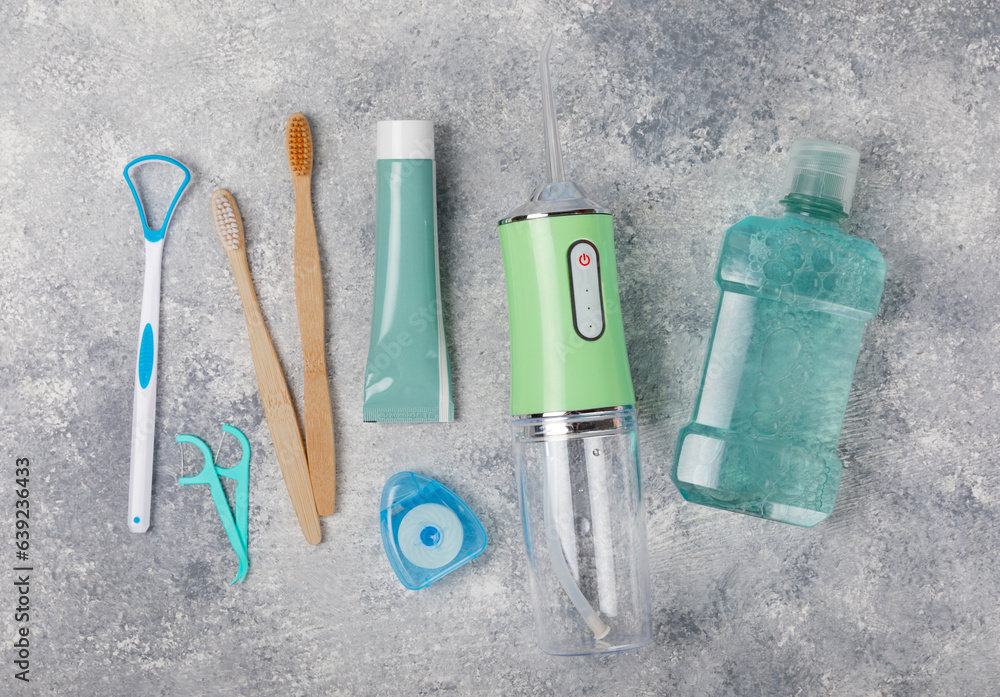 Electronic oral irrigator, toothbrush, paste, dental floss and ...