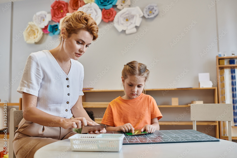 smart girl counting near female teacher, chalkboard, learning how to ...