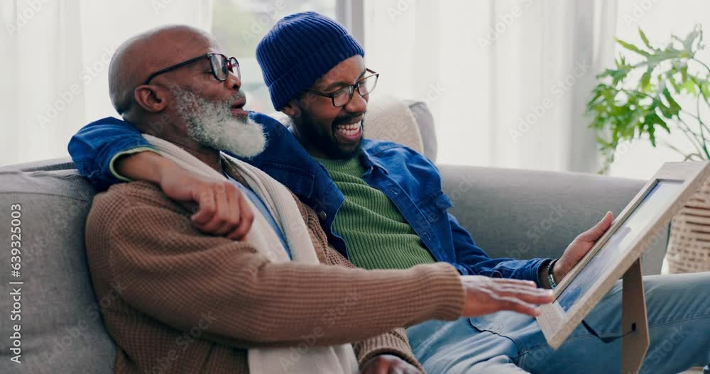 Family, picture frame and a senior father with his son on a sofa in the ...