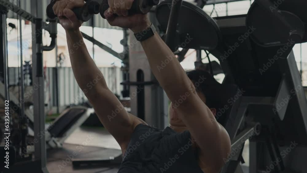 Man Bodybuilder Pulls Weight Machine, Building Forearm Strength ...
