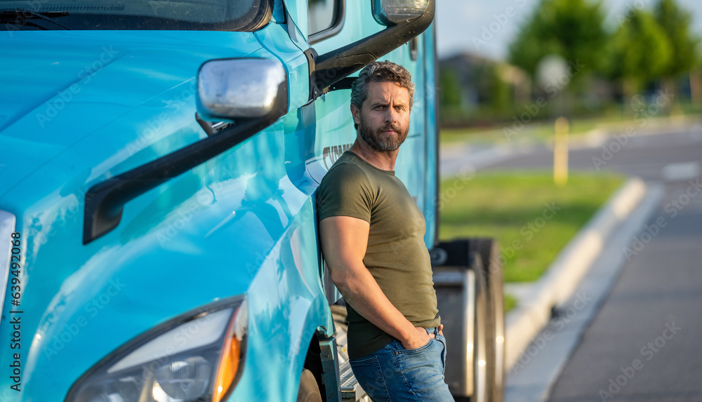 hispanic man posing in front of truck. Semi trucks vehicle. man driver ...