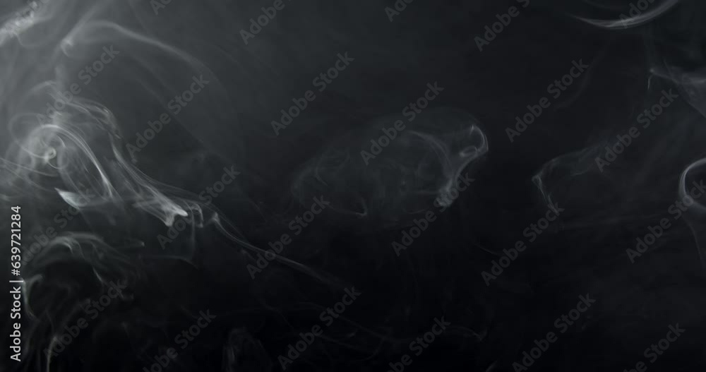 Smoke filled room with a terrifying human skull, haunted spirt, or ...