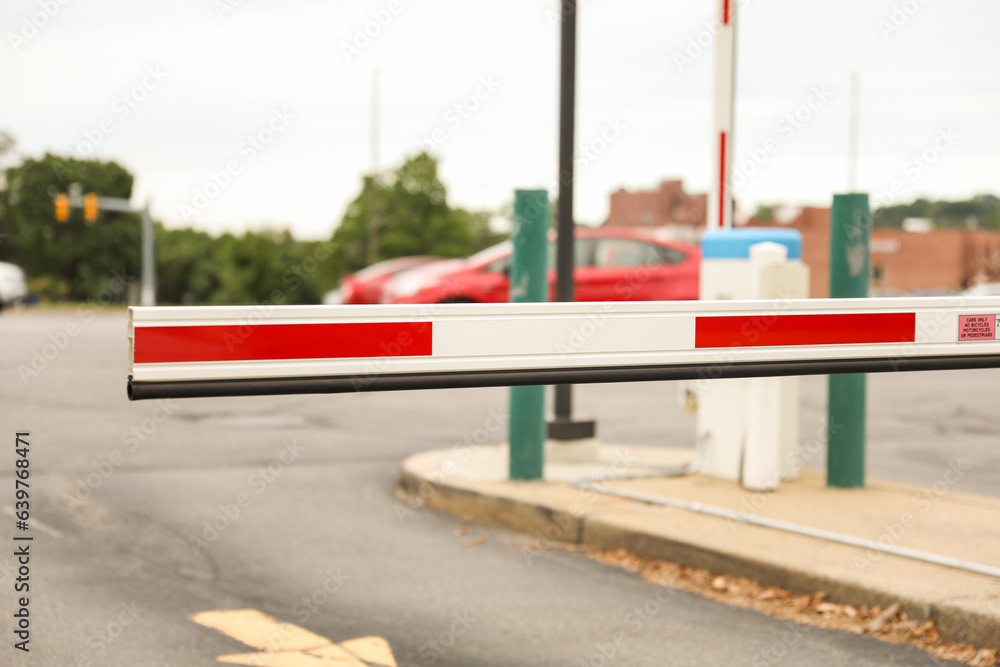parking lot gate, a barrier depicting control, access restriction ...