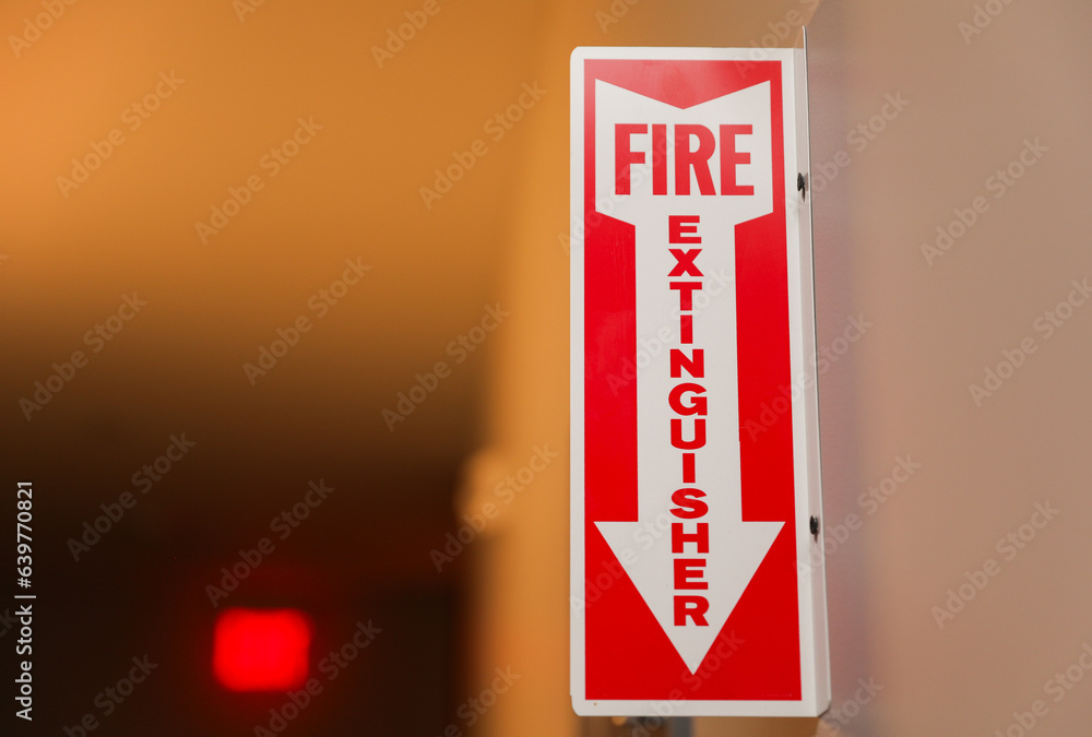 Fire extinguisher and sign depicting safety, urgency, preparedness, red ...