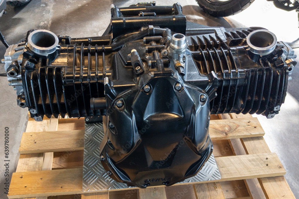 BMW motorcycle open flat engine two cylinder head cover in dealership ...