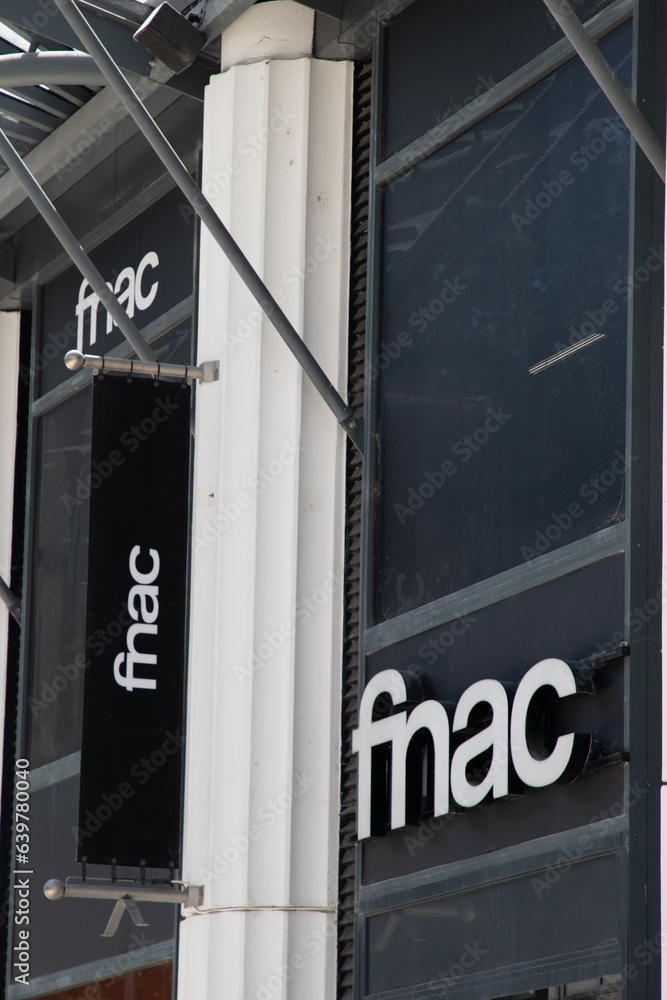 Fnac brand shop logo and text sign front facade wall entrance store ...