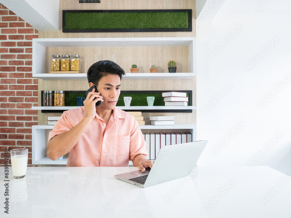 Asian traveller man confirm booking with airline call center by ...