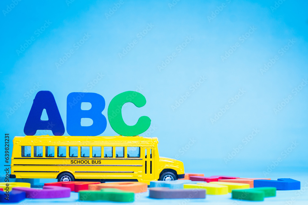 English alphabet scattered on texture blue background. The concept of ...