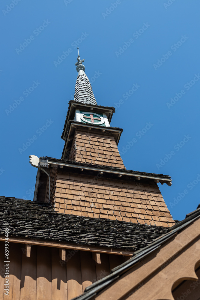 Low angle view of a 20th century wooden built church steeple in the ...