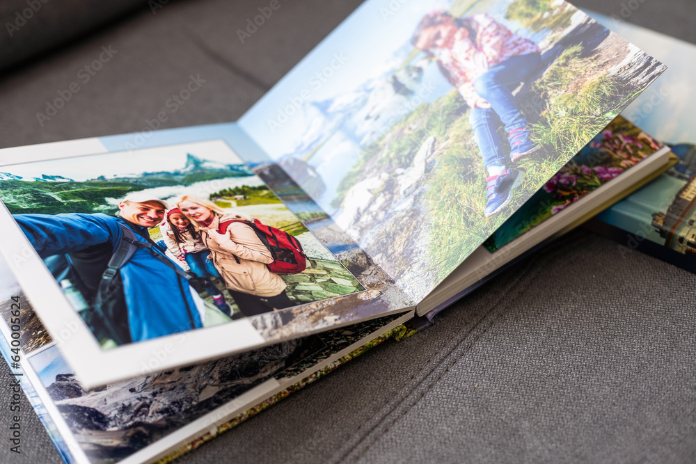 close up. photo book binding. storing photos from a photo session in a ...