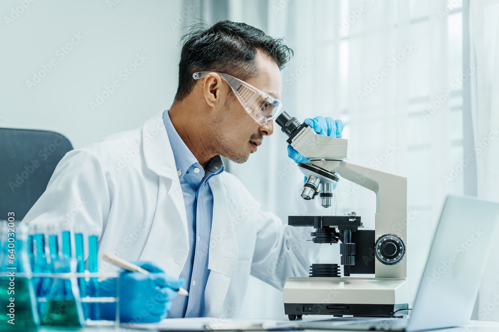 Asian male scientists white coat conducting research investigations ...