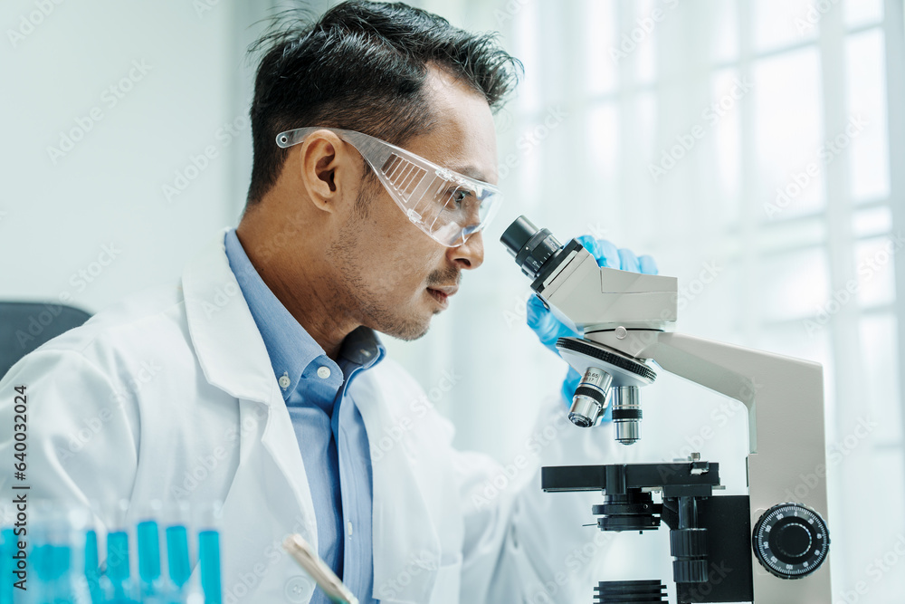 Asian male scientists white coat conducting research investigations ...
