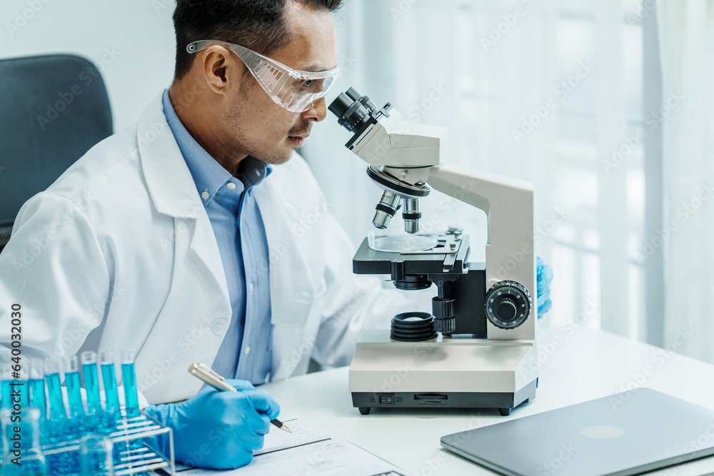 Asian male scientists white coat conducting research investigations ...