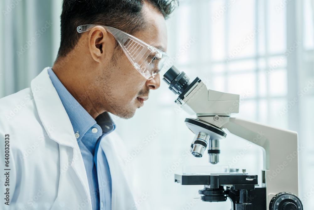 Asian male scientists white coat conducting research investigations ...