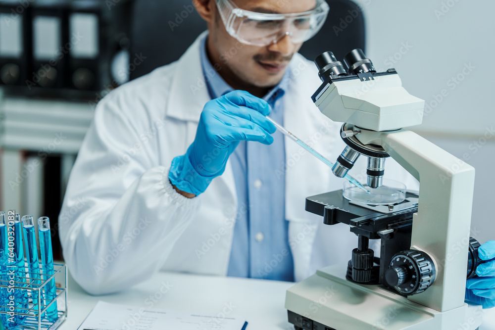 Asian male scientists white coat conducting research investigations ...