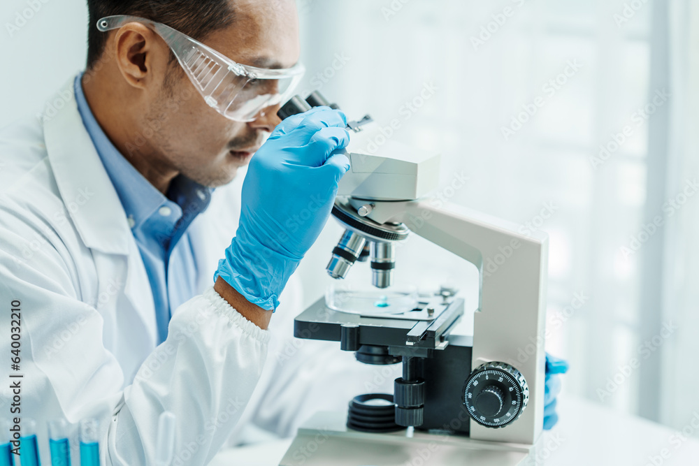 Asian male scientists white coat conducting research investigations ...
