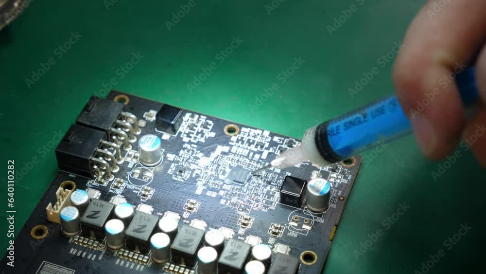 Desoldering the chip using a C210 soldering iron. Maintenance and ...