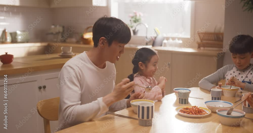 Portrait of Happy Korean Family Members Enjoying Delicious Food ...