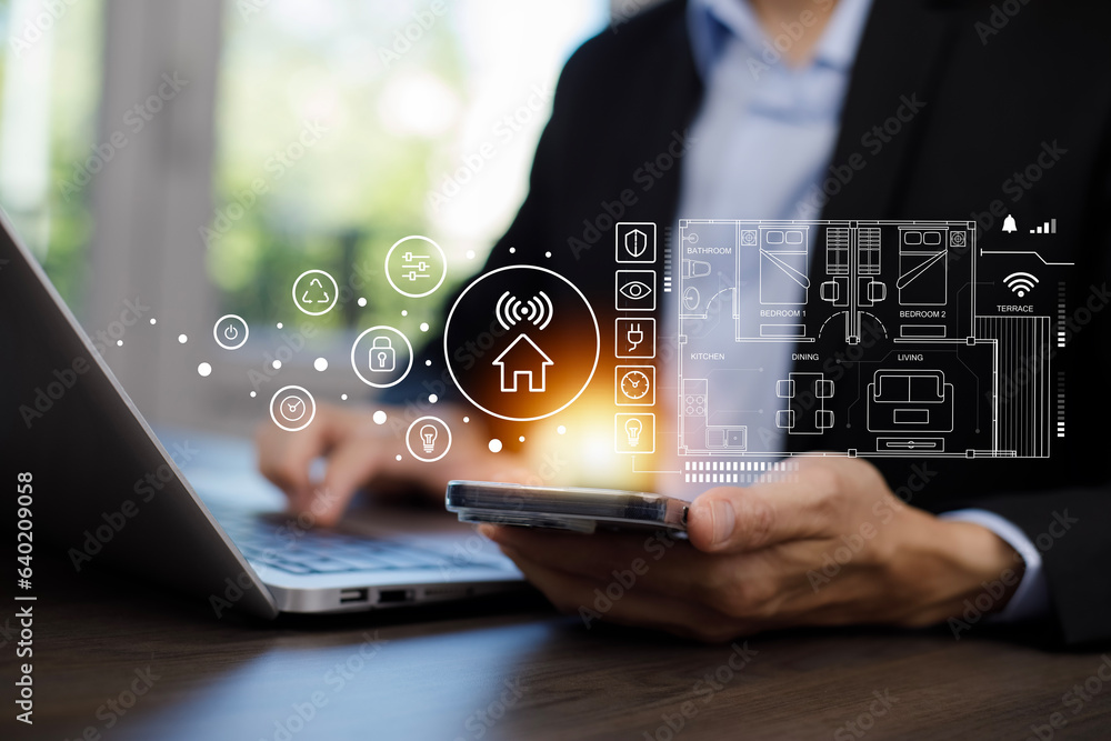 Hand using AI smart tablet with smart home app on the room, circular ...