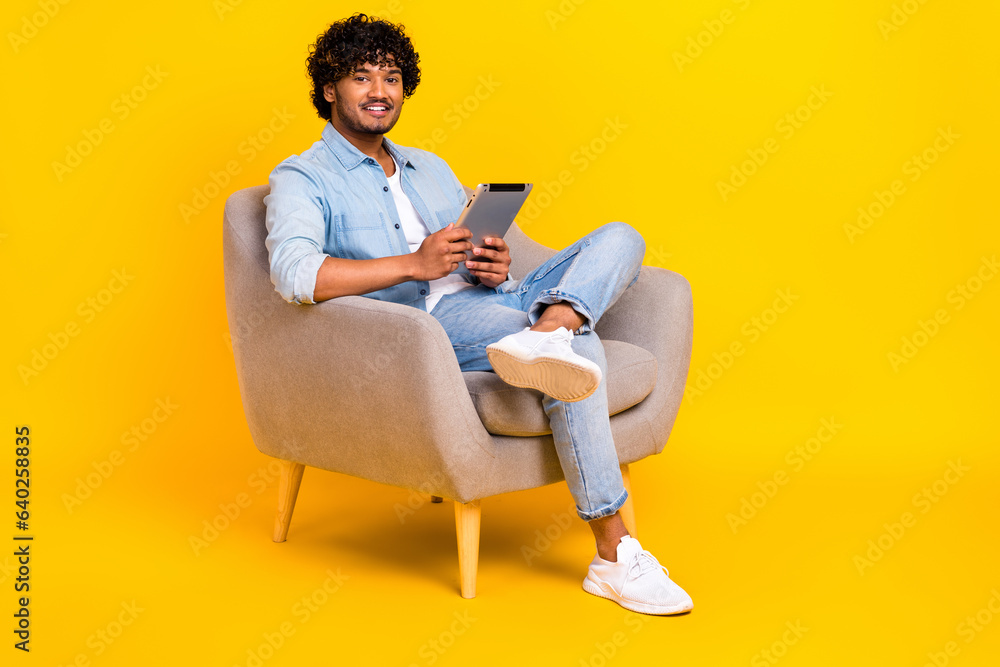 Full size photo of intelligent handsome man dressed denim shirt sit in ...