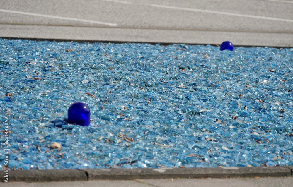 Blaue Glasscherben auf der Straße als Deko Stock Photo | Adobe Stock
