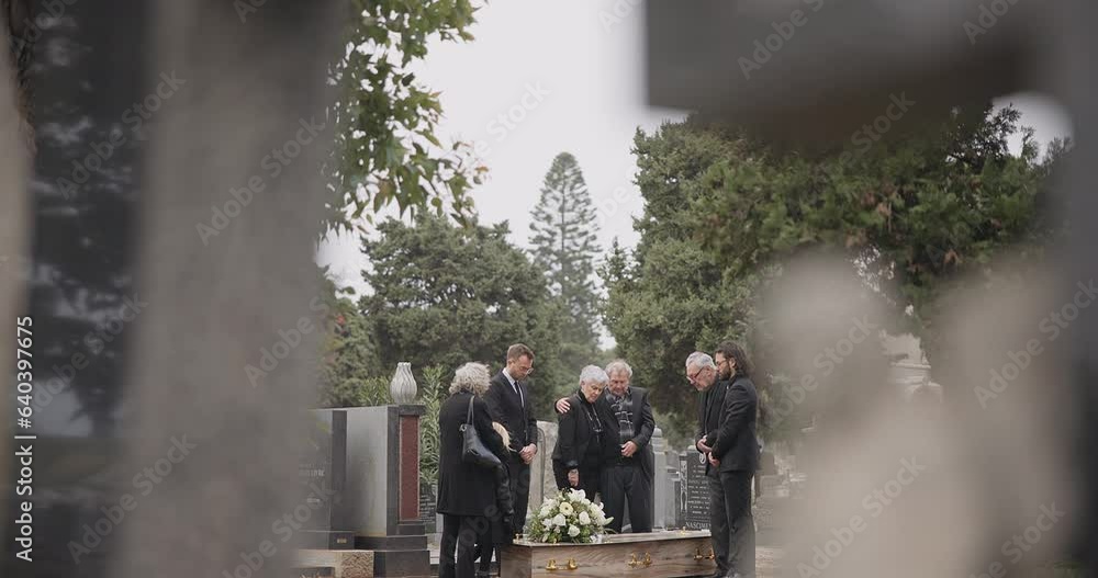 People at a funeral, death and graveyard with family mourning outdoor ...