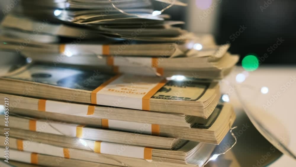 US Dollar bills bundled big stack. Pyramid of many 100 dollars money ...