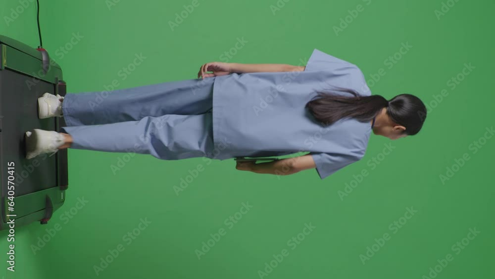 Full Body Of Back View Asian Female Doctor With Stethoscope Holding A ...