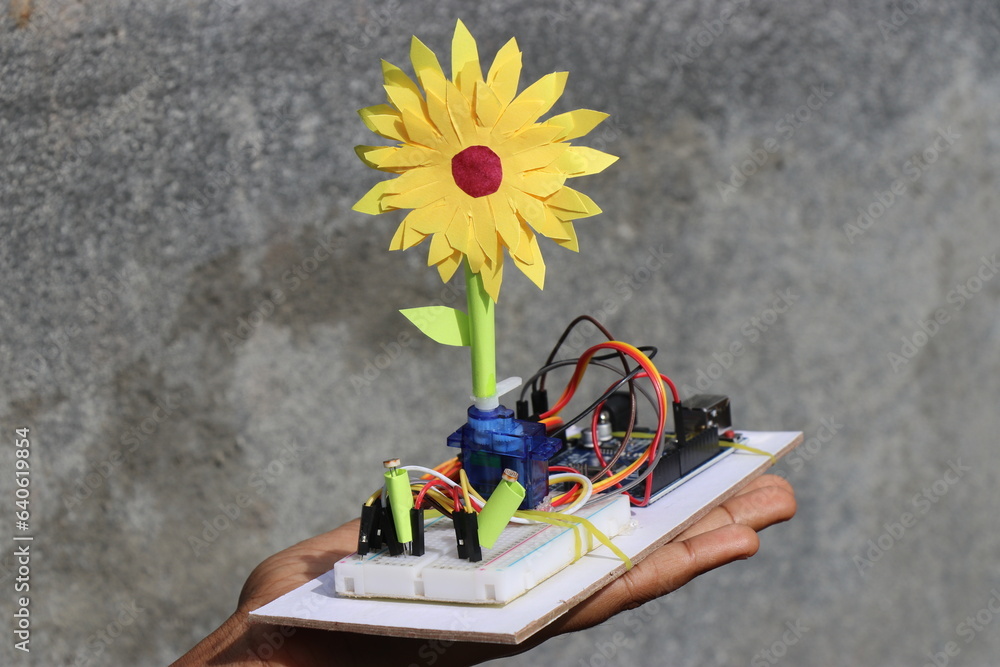 Electronic sunflower project made using LDR sensor and servo held in ...