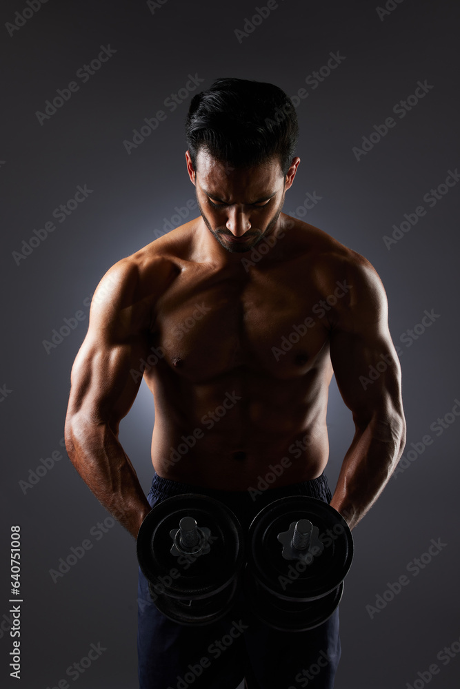 Muscle, dark studio and man with dumbbell challenge, arm workout ...