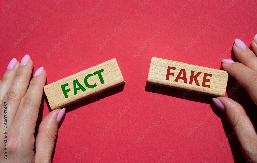 Fact or Fake symbol. Concept word Fact or Fake on wooden blocks ...