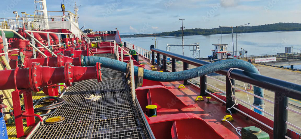 Hose connected and manifold closed for fuel transferring on vessel ...