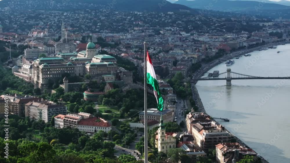 Vidéo Stock Hungarian national flag waving in wind on pole. Sights in ...