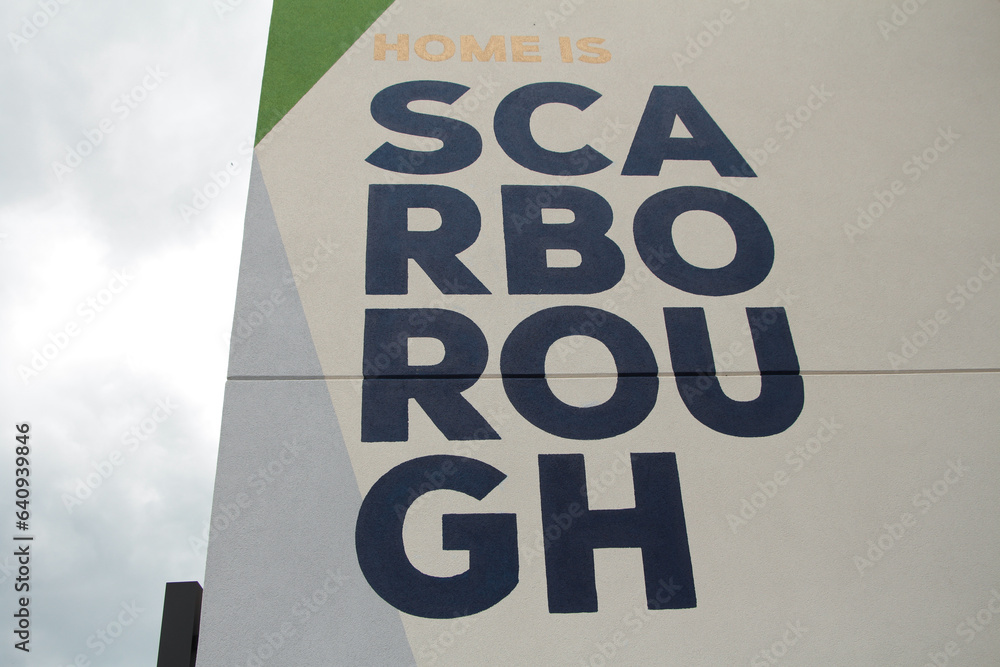 scarborough text caption writing written on side of building in four ...