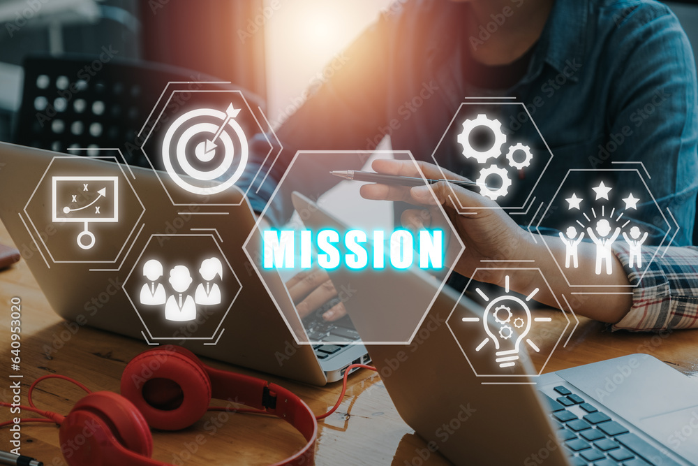 Mission concept, Business team working on laptop computer with mission ...