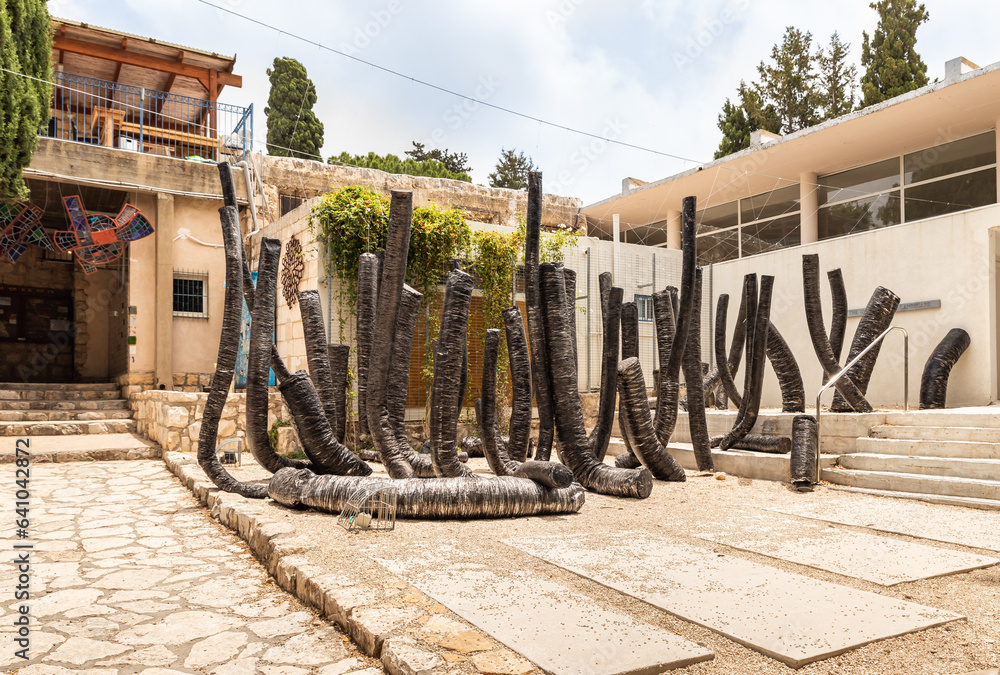 Abstract installation of curved pipes for an air conditioner made by a ...