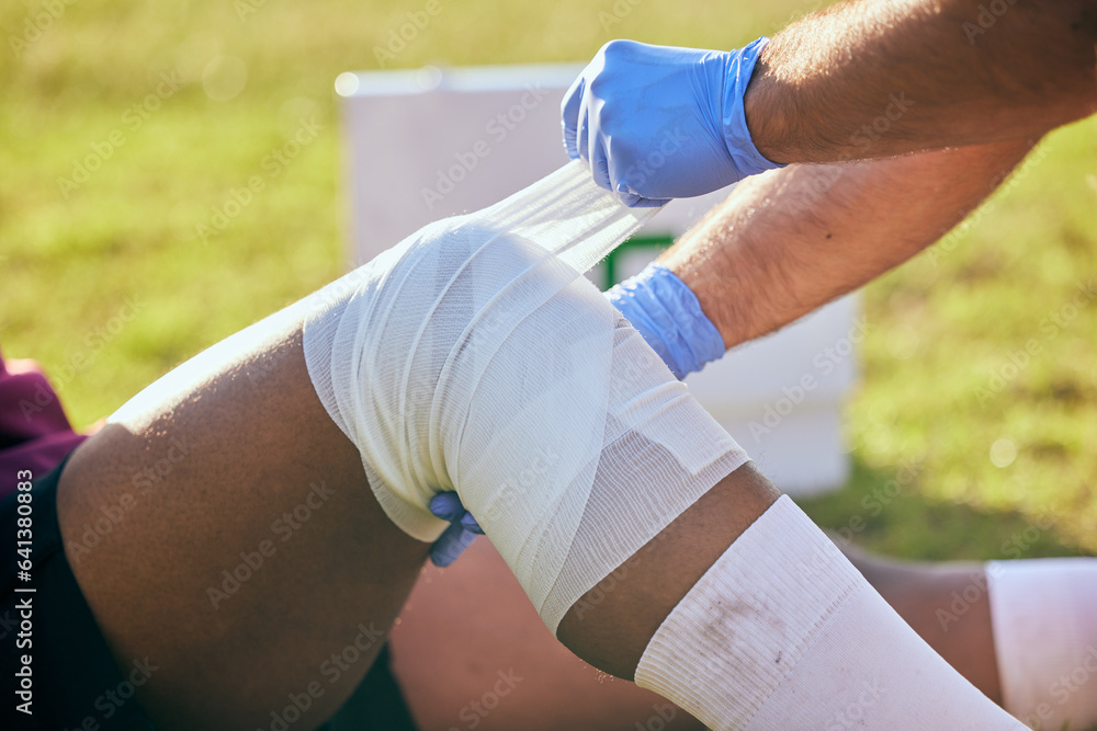 First aid, sport injury and leg bandage with soccer accident, fitness ...