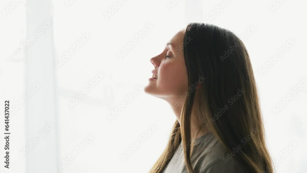 Happy girl smile near window. Girl dream smiling at home. Beautiful ...