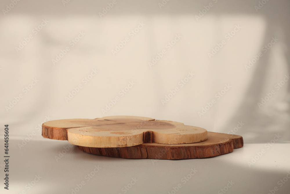 Wooden eco rustic pine tree circle disc platform podium on beige light ...