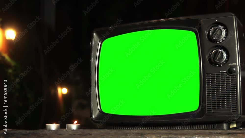 Retro TV Green Screen at Night. Closeup. You can replace green screen ...