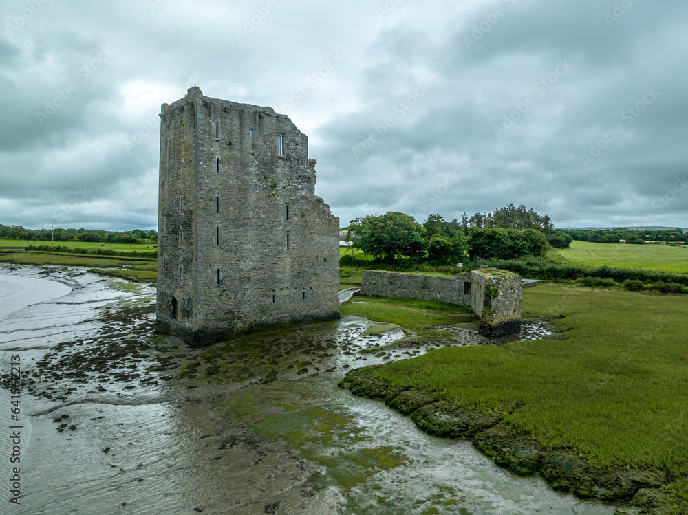 Aerial view of Carrigafoyle castle ruins in Ireland, large Gothic tower ...