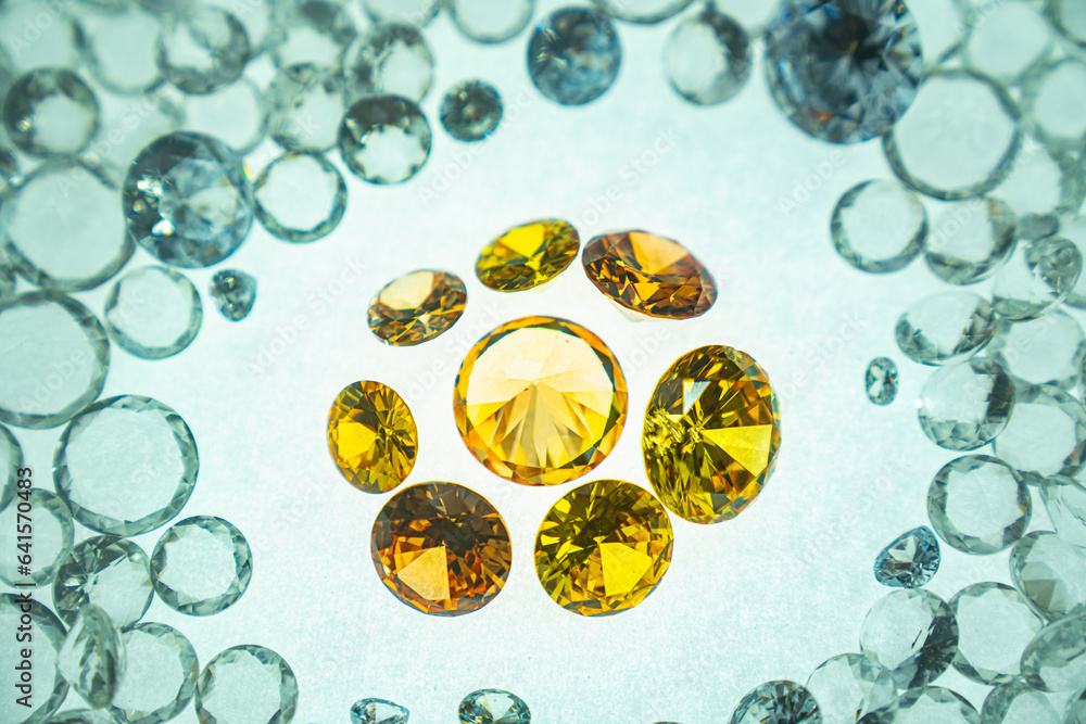 ..A group of yellow diamonds arranged in the middle of white diamonds ...