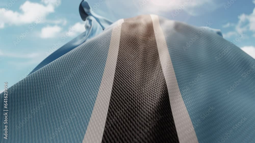 Wavy flag of Botswana blowing in the wind in slow motion. Waving ...